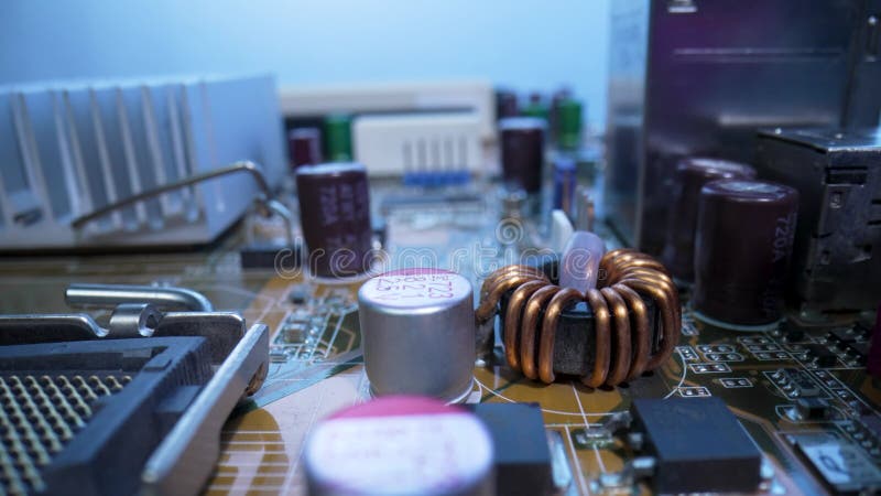 Computer Motherboard with Processor, Capacitors, Chips and Induction ...