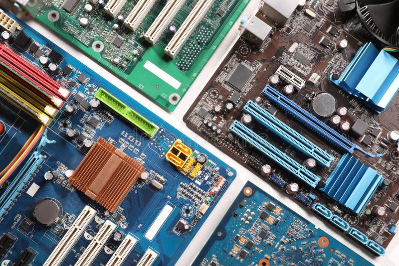 Computer Motherboards on White Table, Flat Lay. Electronic Device Stock ...