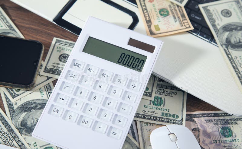 Computer Mouse, Calculator and Money on Computer Keyboard Stock Image ...