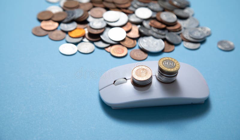 Computer Mouse and Coins on the Blue Background Stock Photo - Image of ...