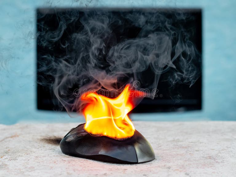Computer Mouse in Flames. Careless Handling of Equipment, Fire Stock ...