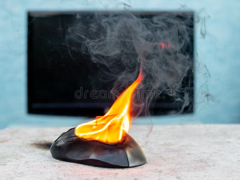 Computer Mouse in Flames. Careless Handling of Equipment, Fire Stock ...