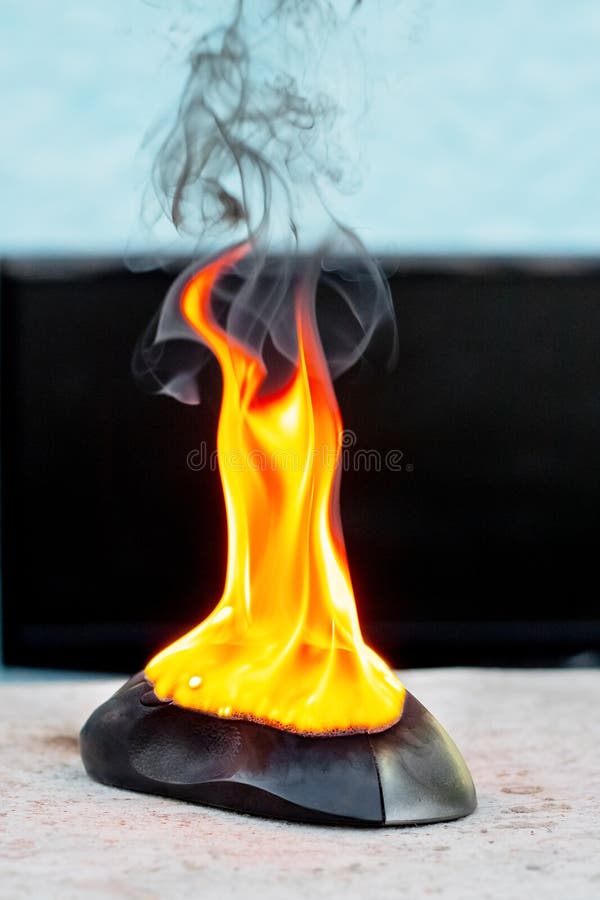 Computer Mouse in Flames. Careless Handling of Equipment, Fire Stock ...