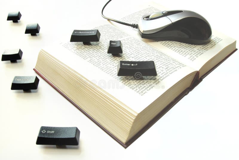 Computer Mouse and Keys on a Book Spread Stock Image - Image of book ...