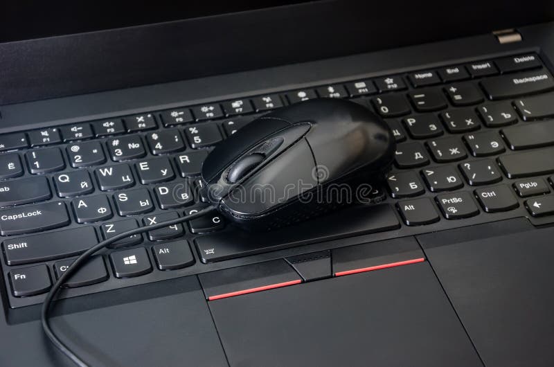 Computer Mouse on Laptop Keyboard Editorial Stock Image - Image of ...