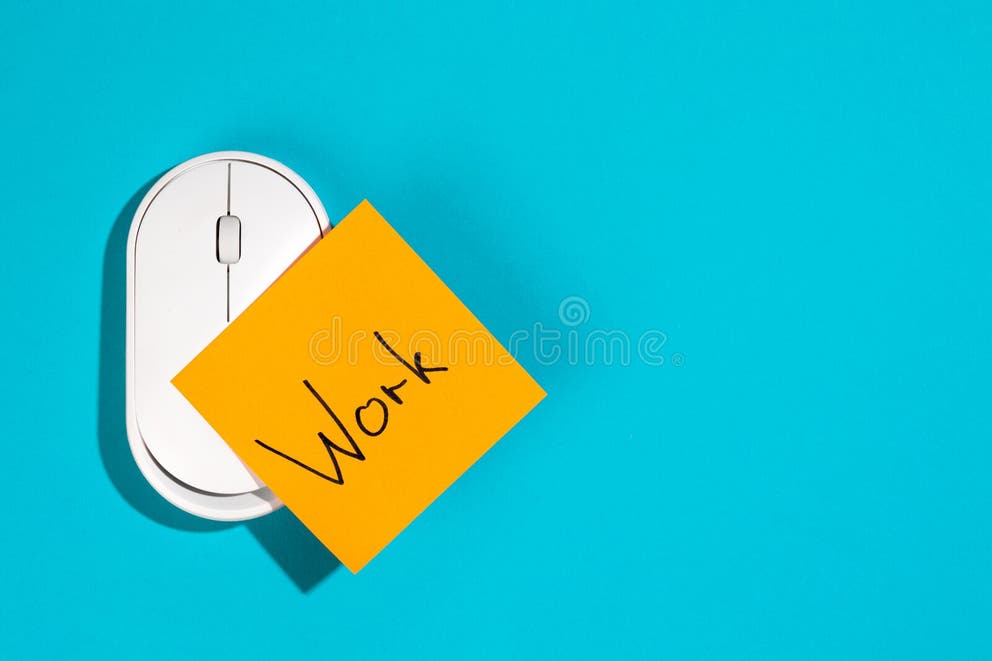 Computer Mouse and Reminder Paper with the Word Work on a Blue ...