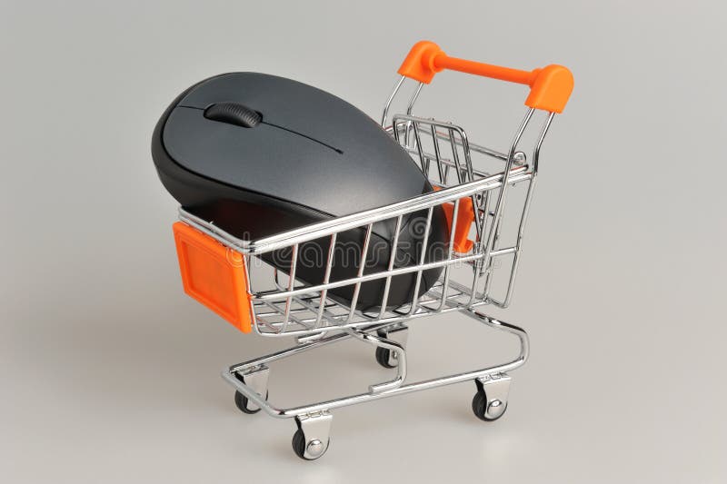 A Metal Cart From The Supermarket With A Computer Mouse. The Concept Of ...