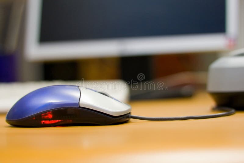 Computer mouse on a table stock photo. Image of table - 7401760