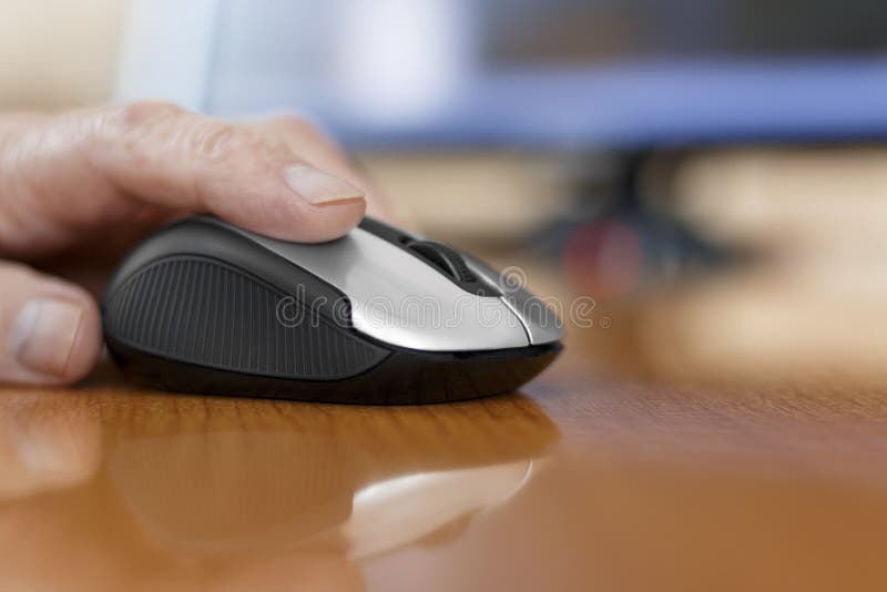 Computer mouse on a table stock photo. Image of hand - 62704908