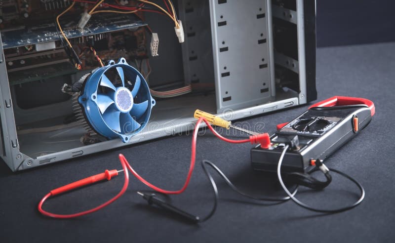Computer with a Multimeter. Checking Stock Image - Image of broken ...
