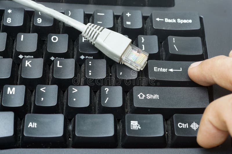 A Computer Network Cable on Black Keyboard, Concept of Internet ...