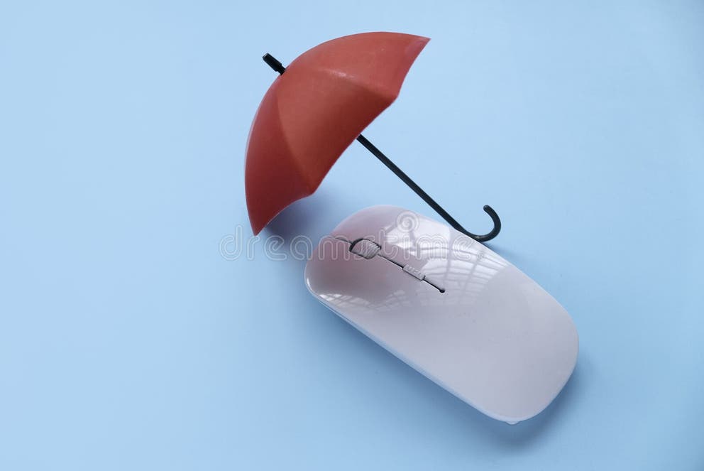 Computer and Network Security Concept. Red Umbrella Over a Computer ...