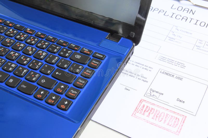 Computer Notebook with Loan Approved Stock Photo - Image of label ...