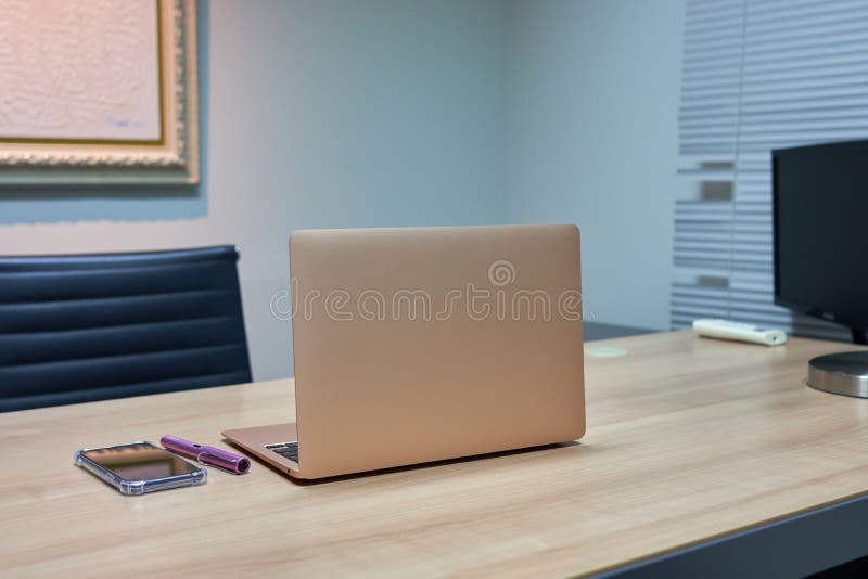 Computer Notebook with Phone Pen on Wood Working Table Stock Image ...