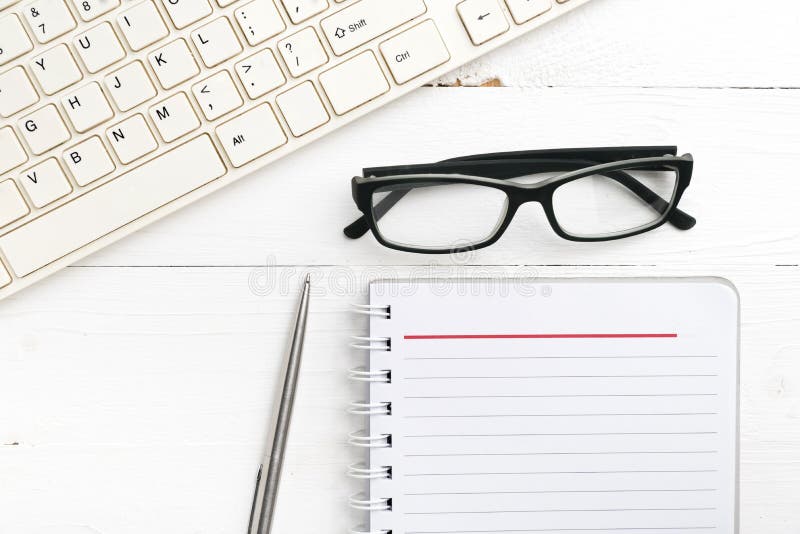 Computer and notepad stock image. Image of phone, wooden - 60338129