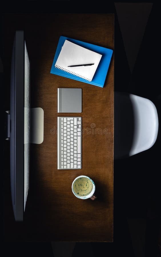 Computer, Notepads and a Cup of Tea on the Desktop at Night, Top View ...