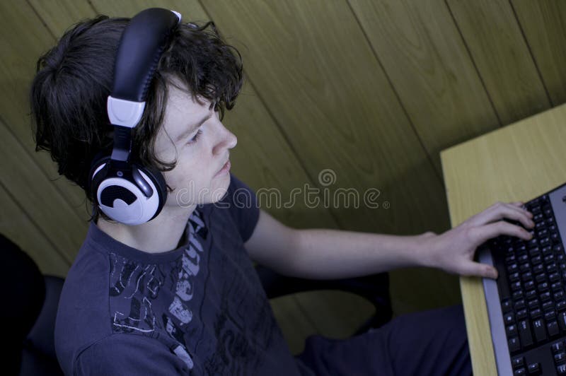 Boy playing computer games stock photo. Image of concentrate - 18087016