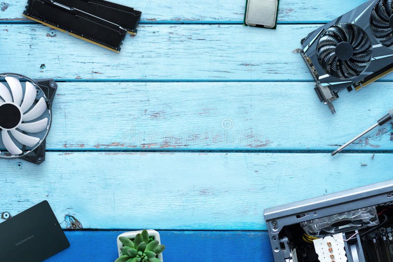 Computer Parts on Blue Wooden Desk. Concept of Computer Assembly Stock ...