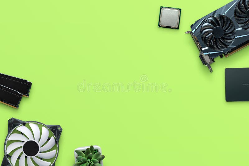 Computer Parts on Green Desk Composition. Free Space in the Middle for ...