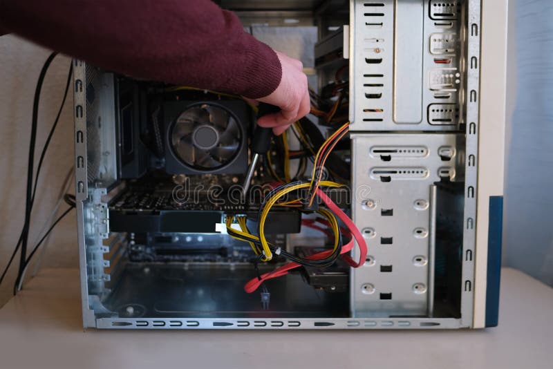 Computer Parts in an Open Case, Colored Wires and Metal Boards, the ...