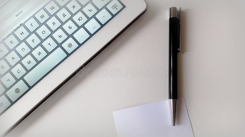 Computer and Pen on the Table. Stock Photo - Image of paper, table ...