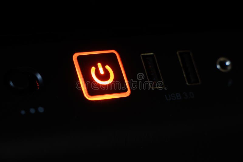 Computer Power Button Glowing in the Dark Stock Photo - Image of ...