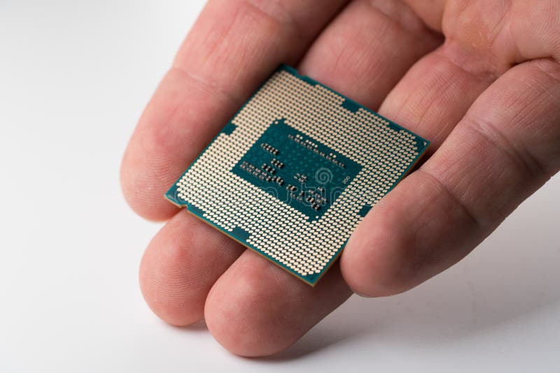 Computer processor in hand stock photo. Image of equipment - 103396038