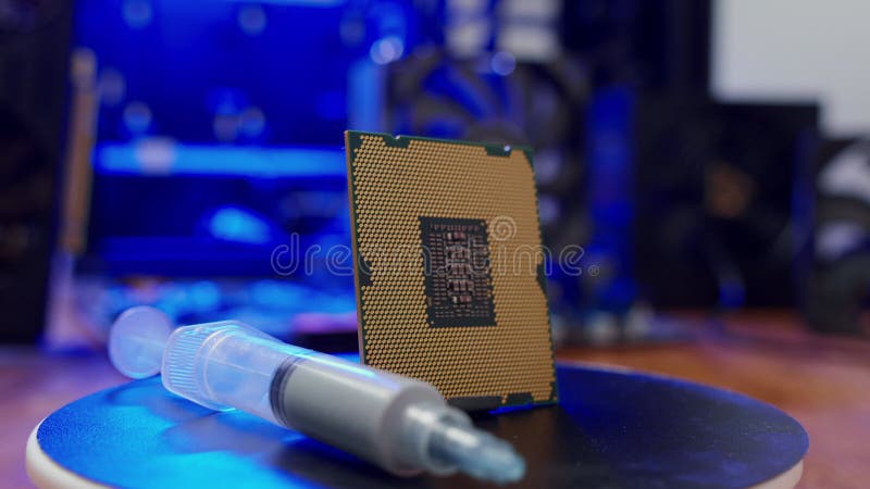 Computer Processor with Thermal Paste Rotates Close Up. Modern Computer ...