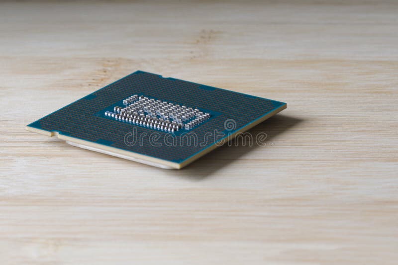 A Computer Processor on a Wooden Background. Side View Stock Image ...