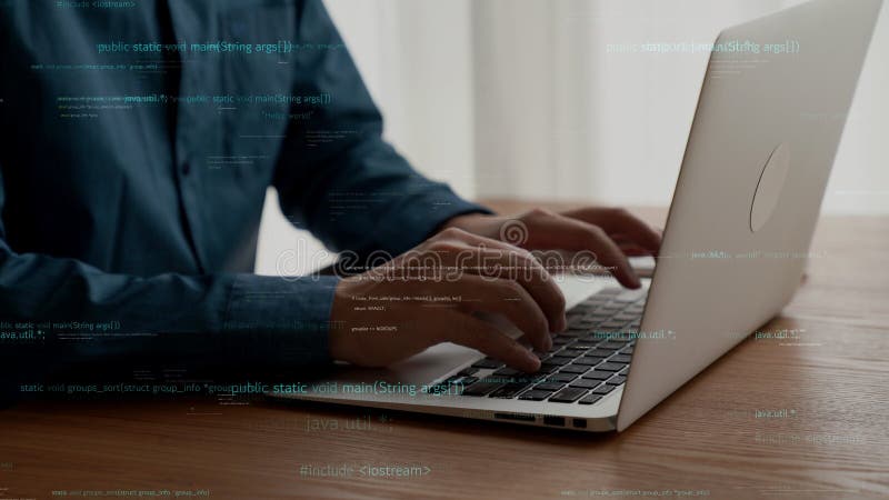 Computer Programmer Uses Capable Laptop Computer To Develop Programming