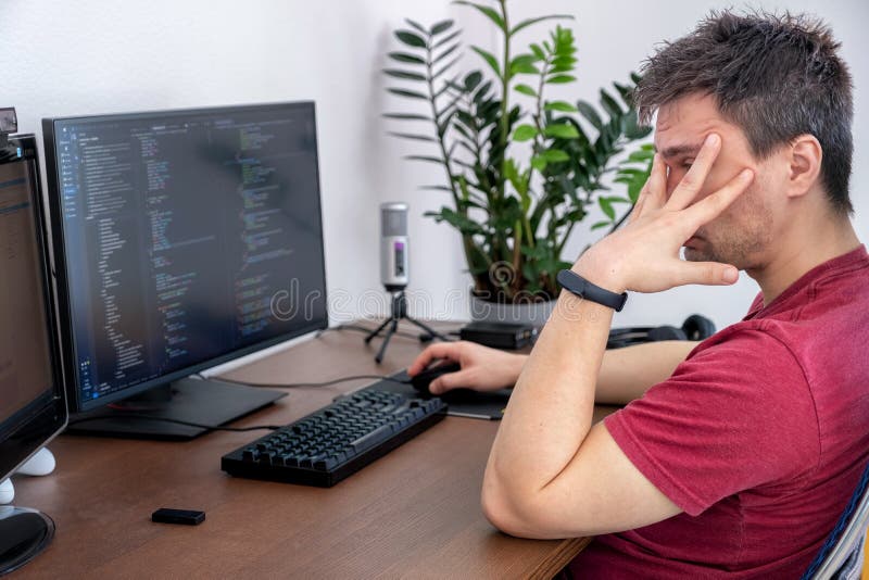 Programmer working at home stock photo. Image of home - 242897438