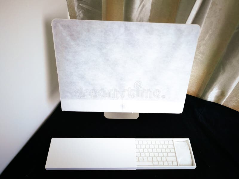 Computer Purchased Online is Still Being Wrapped on a Desk. Editorial ...