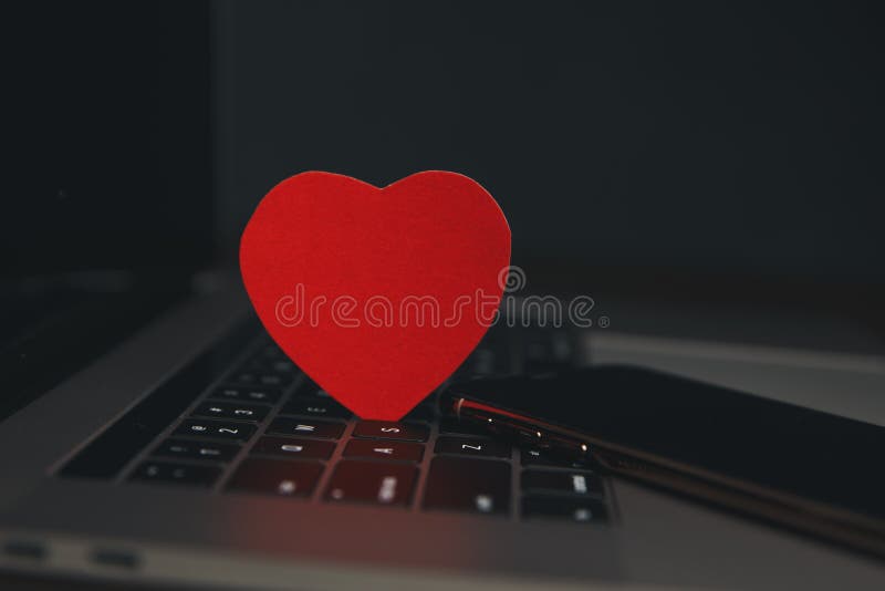 Computer with Red Hearts on Table Close Up Stock Photo - Image of ...
