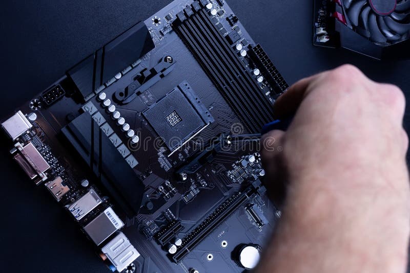 Computer Repair on a Black Background Stock Photo - Image of circuit ...