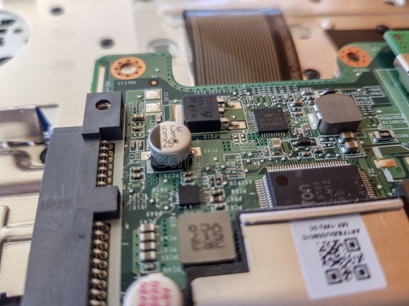 Computer Repair Concept.Close Up the Man Repair Laptop Motherboard with ...