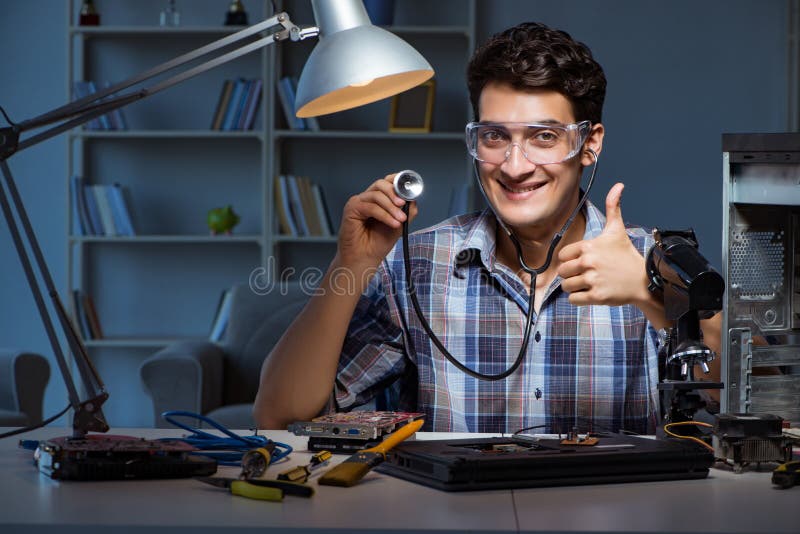 The Computer Repair Concept with Man Inspecting with Stethoscope Stock ...