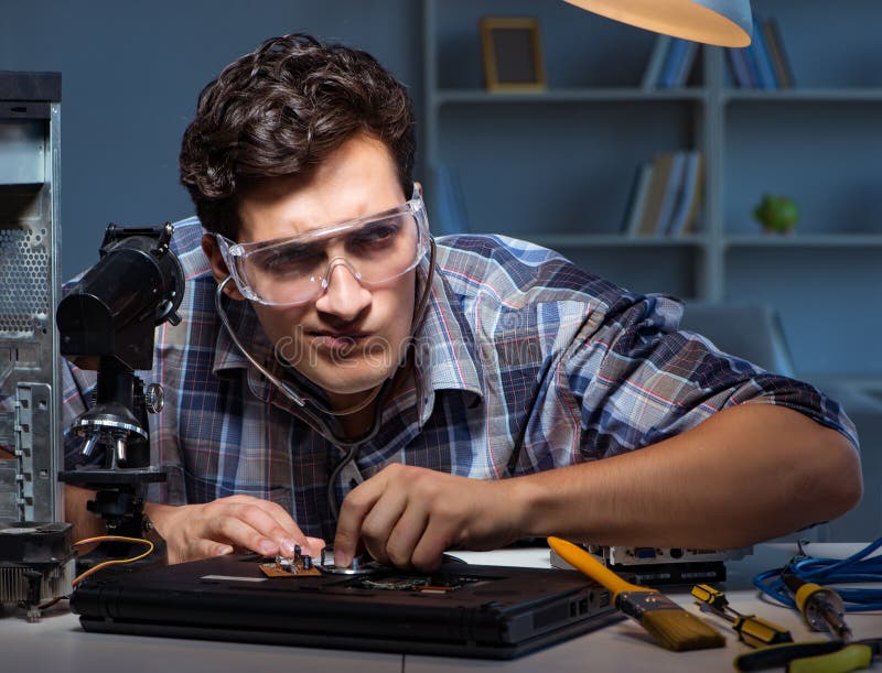 Computer Repair Concept with Man Inspecting with Stethoscope Stock ...