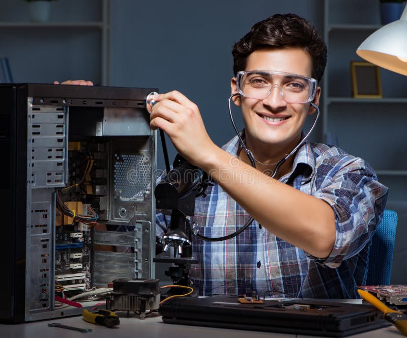 The Computer Repair Concept with Man Inspecting with Stethoscope Stock ...
