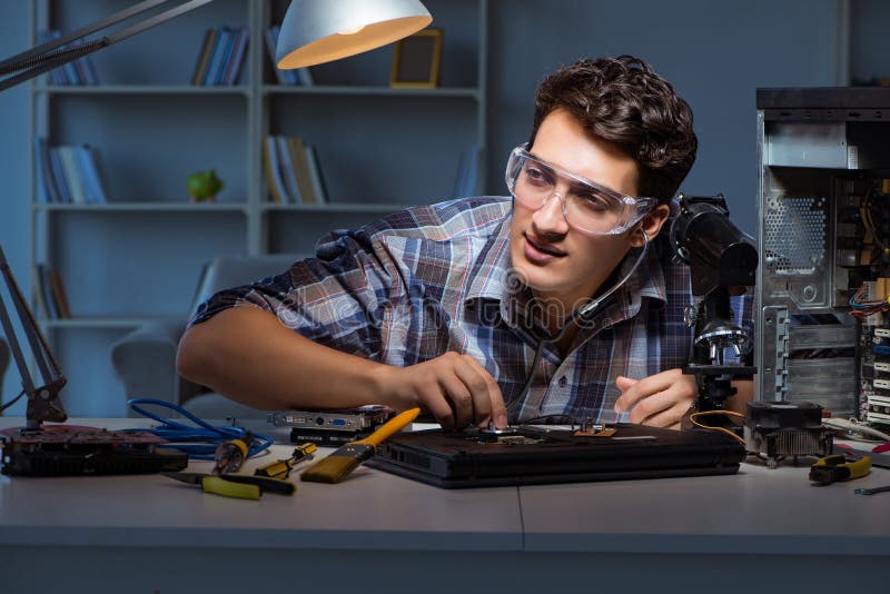 The Computer Repair Concept with Man Inspecting with Stethoscope Stock ...