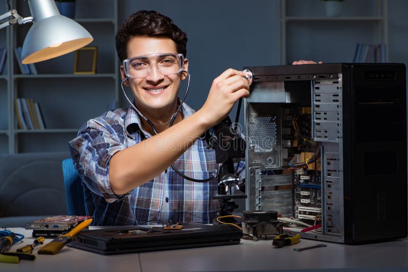 The Computer Repair Concept with Man Inspecting with Stethoscope Stock ...