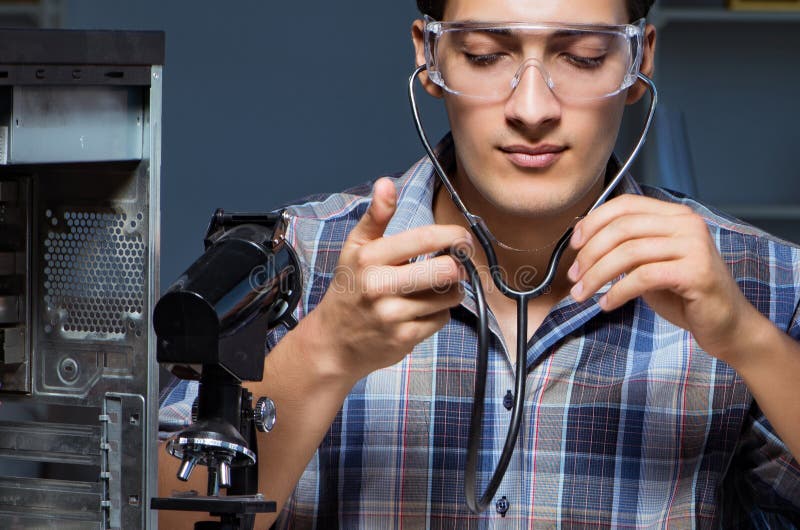 Computer Repair Concept with Man Inspecting with Stethoscope Stock ...