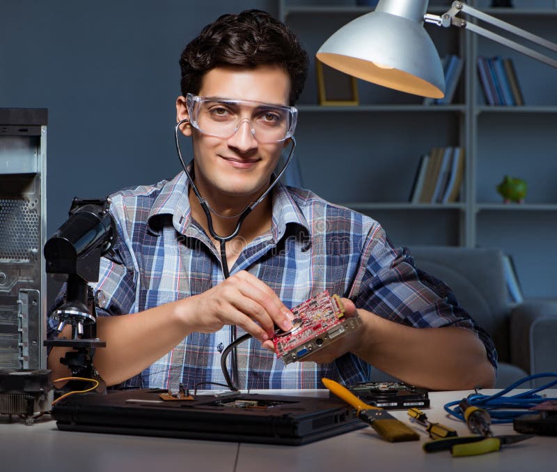 Computer Repair Concept with Man Inspecting with Stethoscope Stock ...