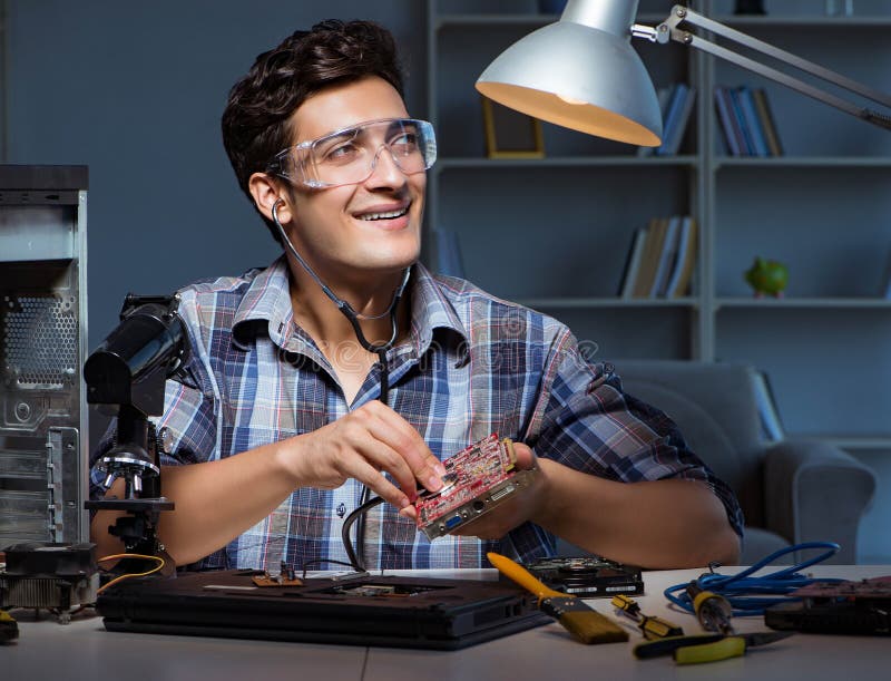 Computer Repair Concept with Man Inspecting with Stethoscope Stock ...
