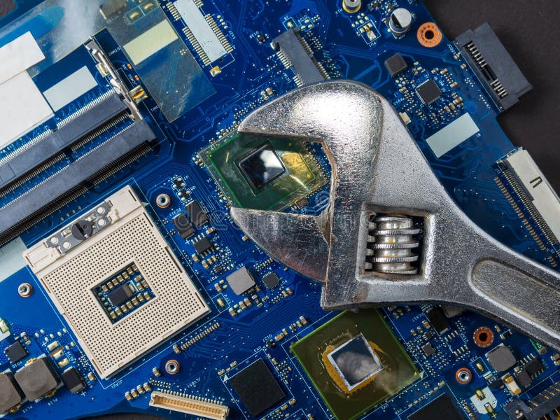 Computer Repair Concept. Old Rusty Passages on a Blue Laptop ...