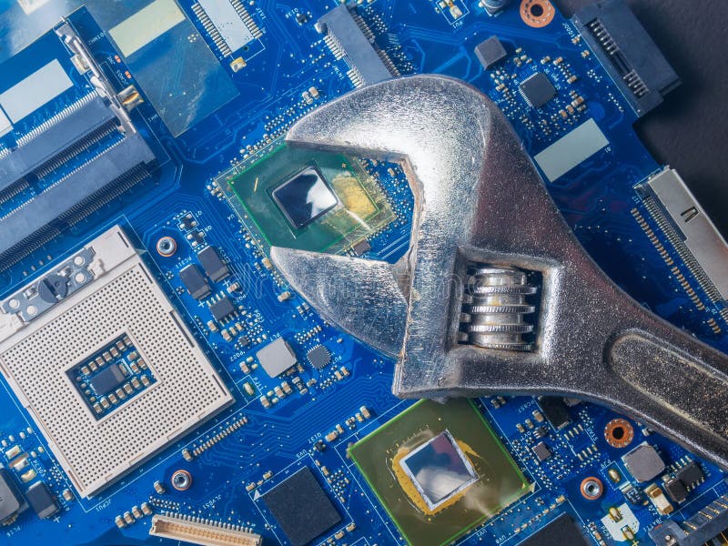 Computer Repair Concept. Old Rusty Passages on a Blue Laptop ...