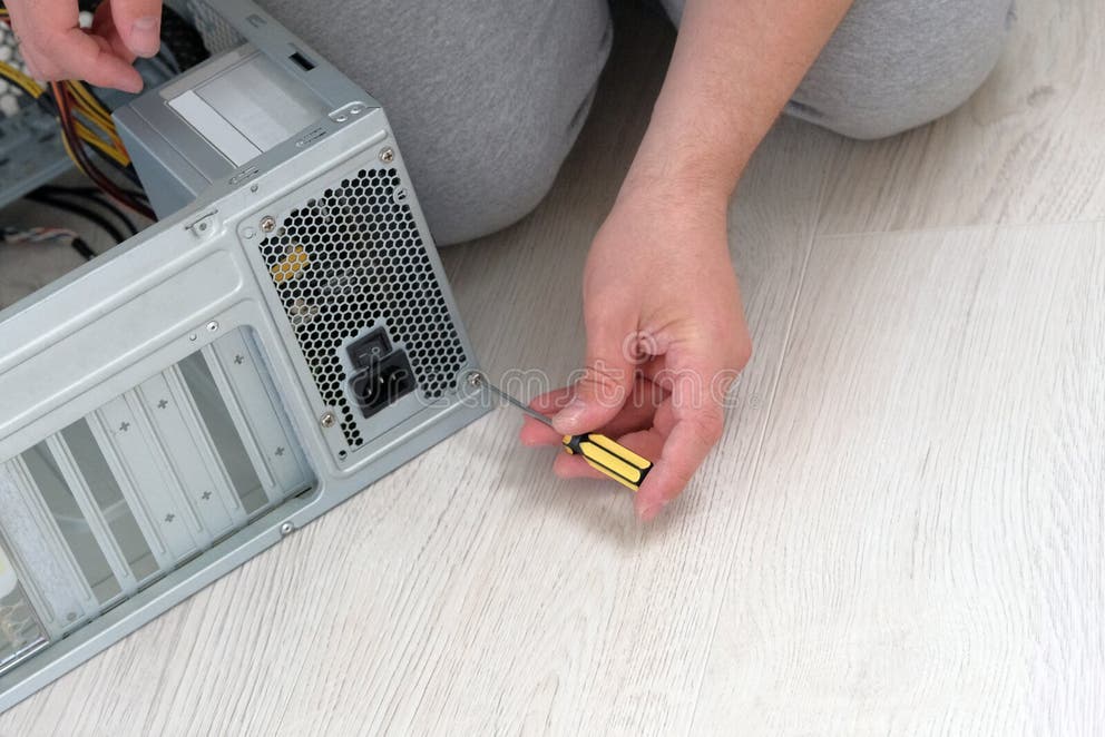 Computer Repair. Hands of Technician is Repairing a Computer Stock ...