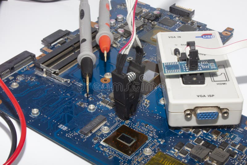 Computer Repair Service. Engineer Repairing Laptop Mainboard. New DC ...