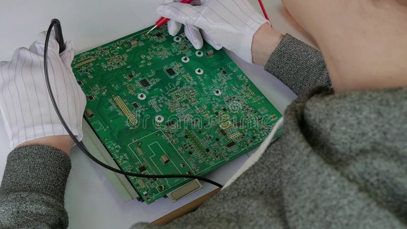 Computer Repair Service, Hands of Man Tech Testing Motherboard with ...