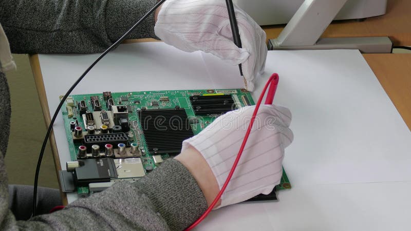 Computer Repair Service, Hands of Man Tech Testing Motherboard with ...