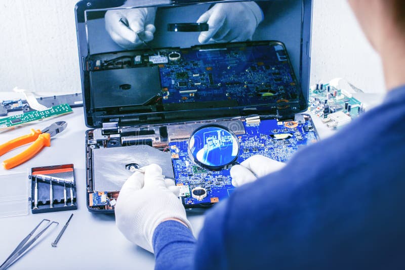 Computer Repair. Tech Fixes Motherboard. Small Business. Stock Photo ... Computer Repair. Tech Fixes Motherboard. Small Business. Stock Photo ...